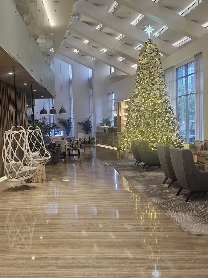 A Christmas Tree is Placed in Hotel Lobby Stock Image - Image of tree ...