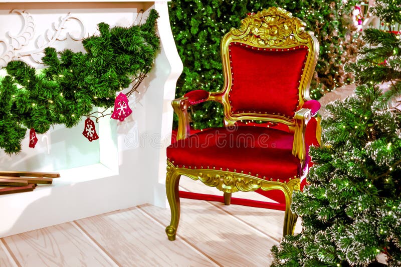 Christmas Tree with Red Chair Stock Photo - Image of decorated, glow ...