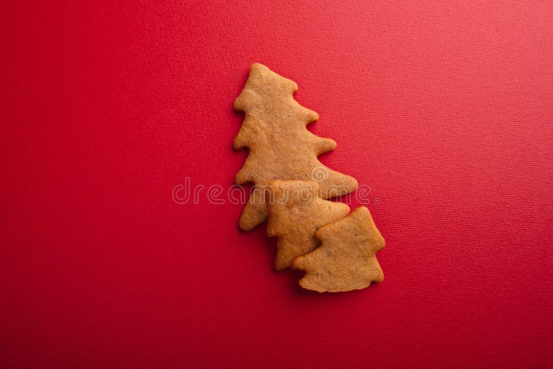 Christmas Tree Shape Cookie on Red Background Stock Image - Image of ...