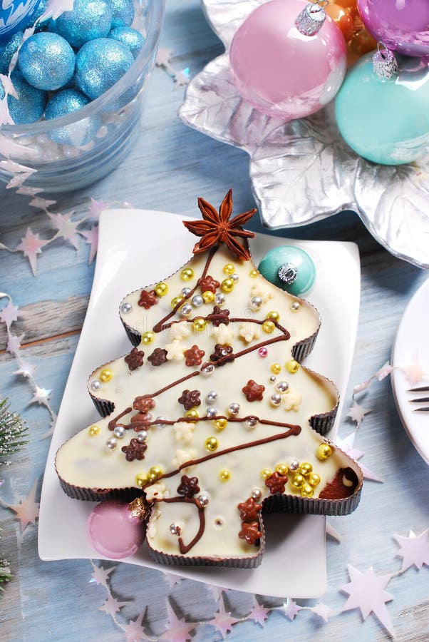Christmas Tree Shaped Cake with Icing and Sprinkles Stock Photo - Image ...
