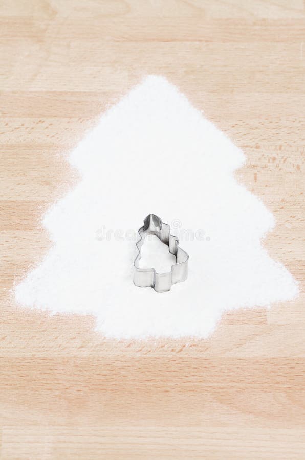 Christmas Tree Shaped Mold in Flour Stock Photo - Image of powder, cake ...