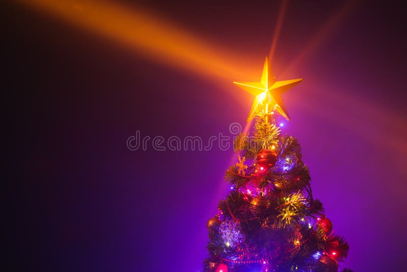 Christmas Tree with Shining Star and Dense Mist Stock Image - Image of ...