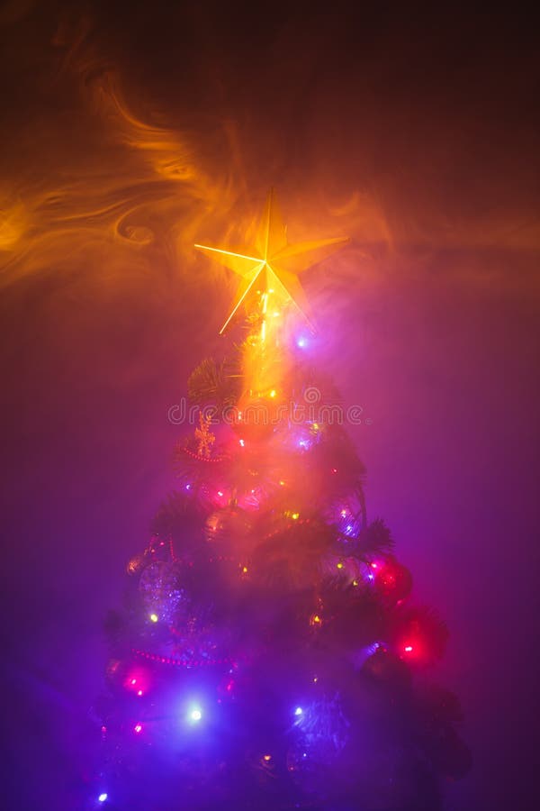 Christmas Tree with Shining Star and Dense Smoke Stock Image - Image of ...