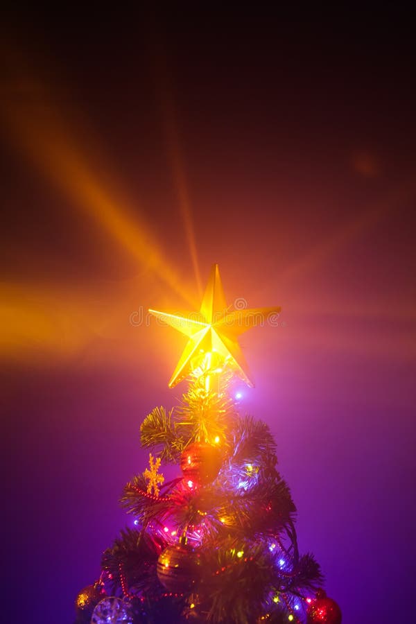 Christmas Tree with Shining Star Stock Photo - Image of gold, purple ...