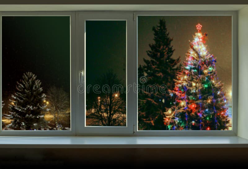 Christmas Tree and Snow-covered Christmas Trees Outside the Window ...