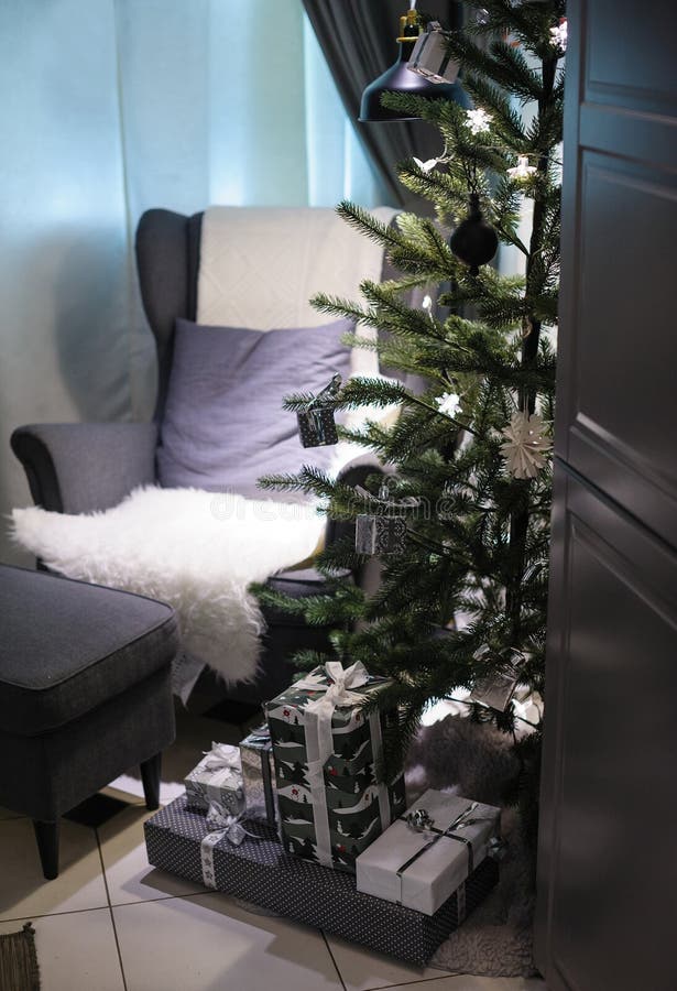 Christmas Tree and a Soft Chair in the Room Stock Image - Image of ...