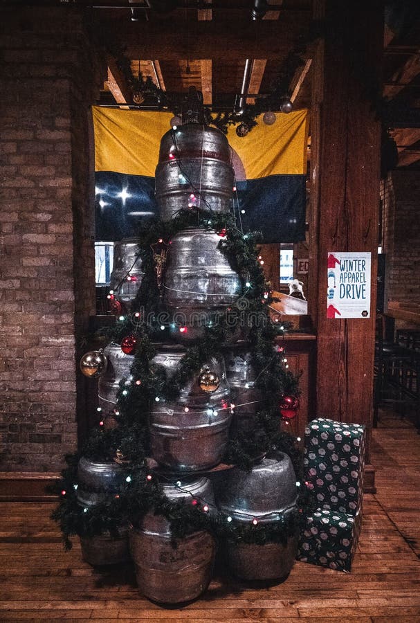 Christmas Tree with a Stack of Metal Barrels Editorial Photography ...