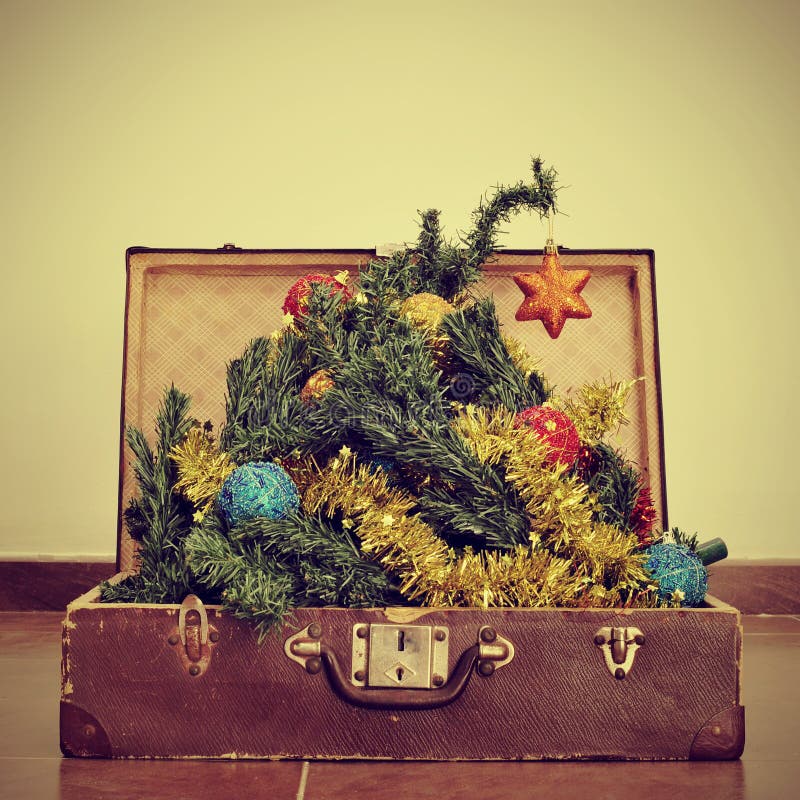 Christmas Tree in a Suitcase Stock Photo - Image of christmas, greeting ...