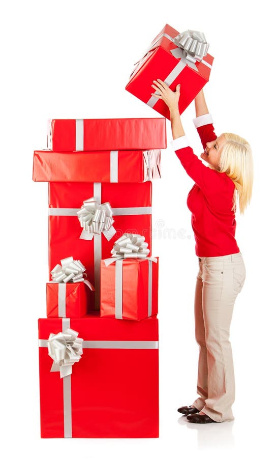 Christmas: Woman Making Huge Stack of Gifts Stock Photo - Image of ...
