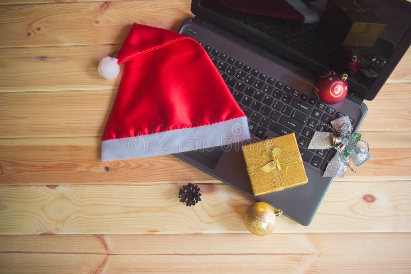 Christmas Workspace with Laptop, Santa Claus Hat and Christmas ...