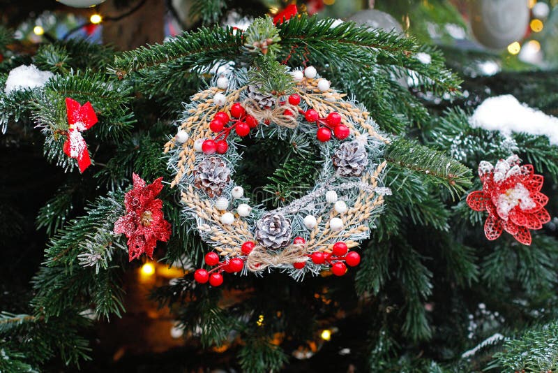 Christmas Wreath on a Christmas Tree Stock Image - Image of decoration ...