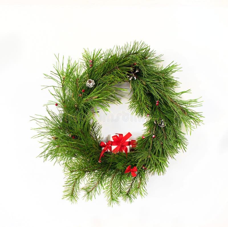 Christmas Wreath with Red Ribbon and Gift Box Stock Photo - Image of ...