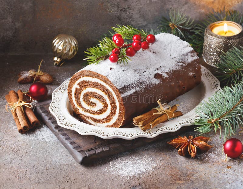 Christmas Yule Log Cake at the Table. Christmas Food Concept Stock ...