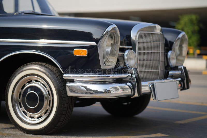 The Chrome Bumper of a Vintage Car Glows with Light, Adding To the Car ...