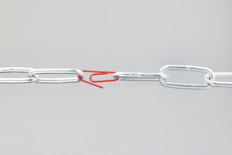 Chrome Chain in Middle with Red Paper Clip Stock Photo - Image of metal ...