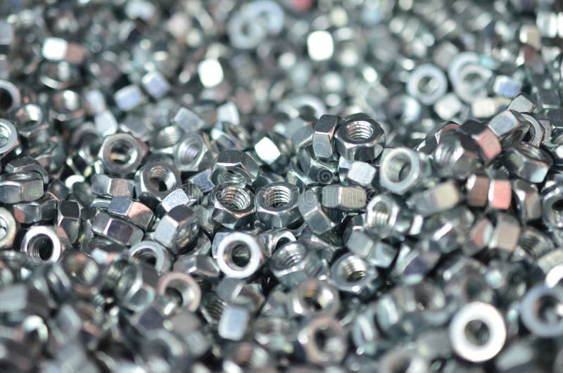 The Chrome Glossy Nut Nuts are a Lot Close-up. Stock Photo - Image of ...