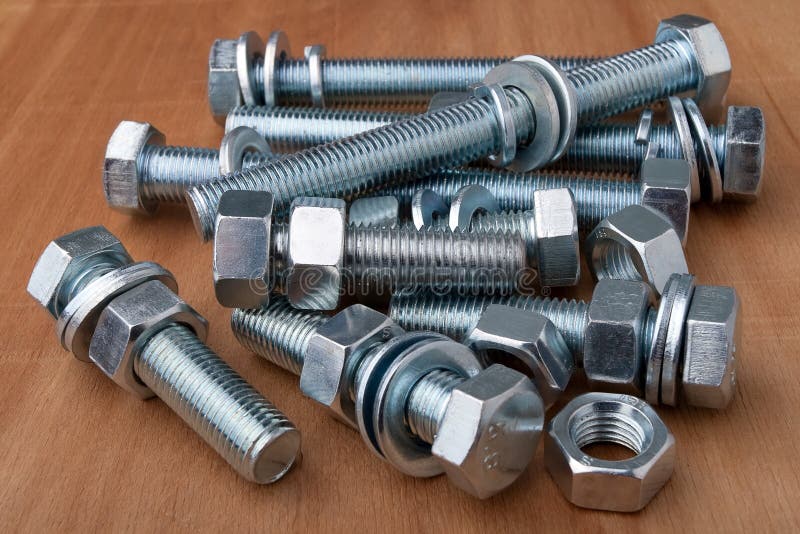 Chrome nuts and bolts stock photo. Image of stainless - 19101044
