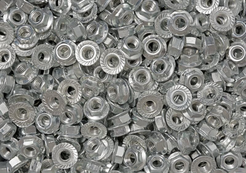 Chrome nuts and bolts stock image. Image of industry - 18747053