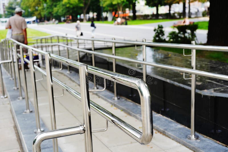 Chrome-plated Railings Installed on a City Street. Foreground Stock ...