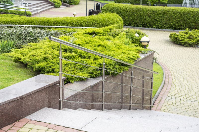 Chrome Railing on with Dulls in a Multi-tiered Park Stock Photo - Image ...