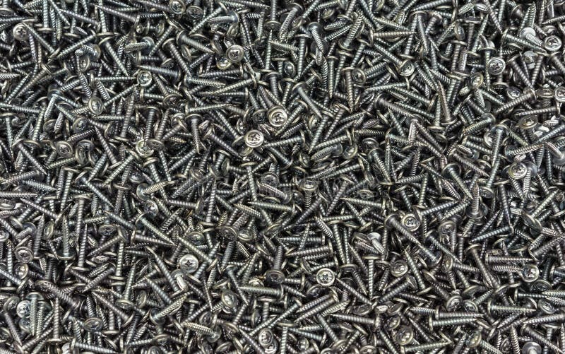 Chrome Screws on the Counter of a Hardware Store. Background of the ...