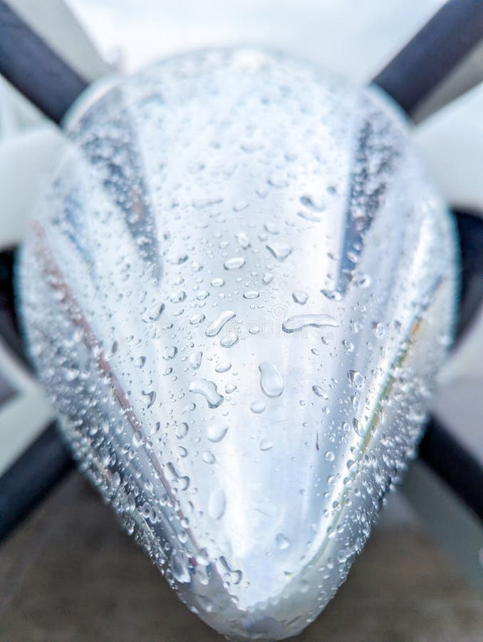 Chrome Shiny Aircraft Spinner Cone with Rain Drops Stock Image - Image ...