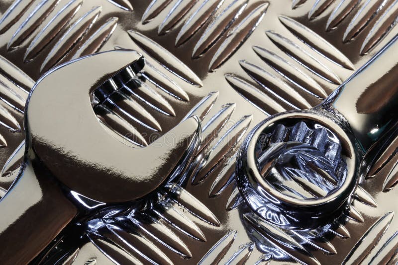 Chrome Spanner Heads on Metal Tread Plate Stock Photo - Image of ...