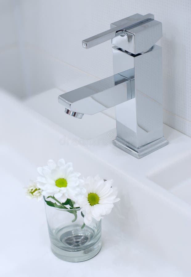 Chrome Tap Water and Flower Stock Image - Image of chrome, dripping ...