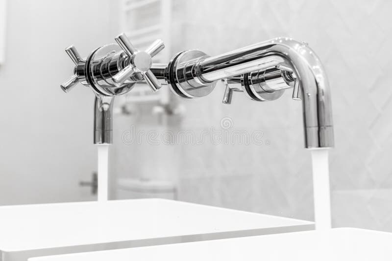 Chrome Water Jet Faucet Set into a Wall Stock Image - Image of lamp ...