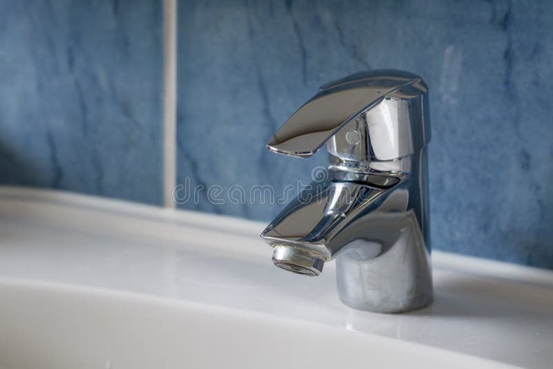 Water Tap in the Bathroom from the Side Stock Image - Image of stream ...