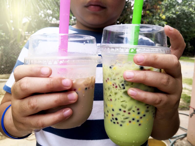 Boy is Carrying Two Boba Milk Tea Stock Image - Image of refreshment ...