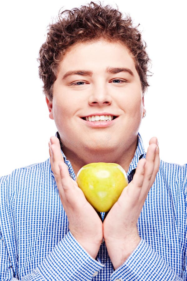 Chubby man holding apple stock image. Image of natural - 23748957