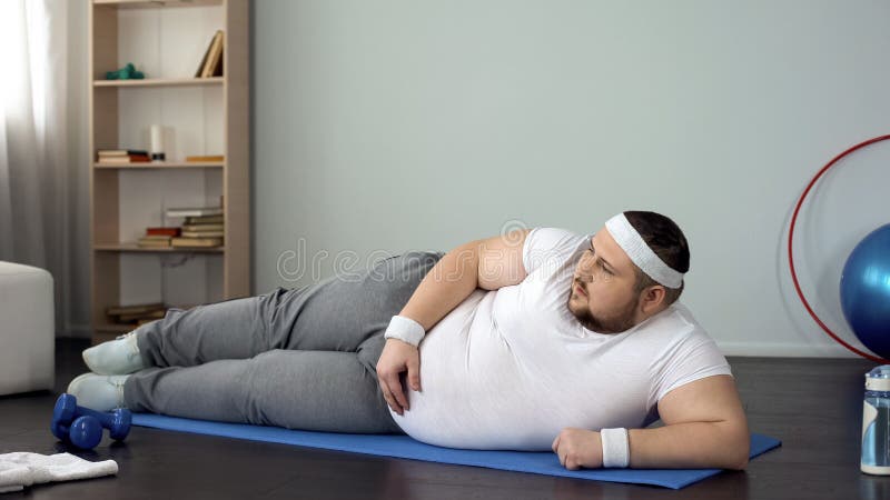 Overweight Man Lying on Sports Mate, Going To Do Plank Exercise ...