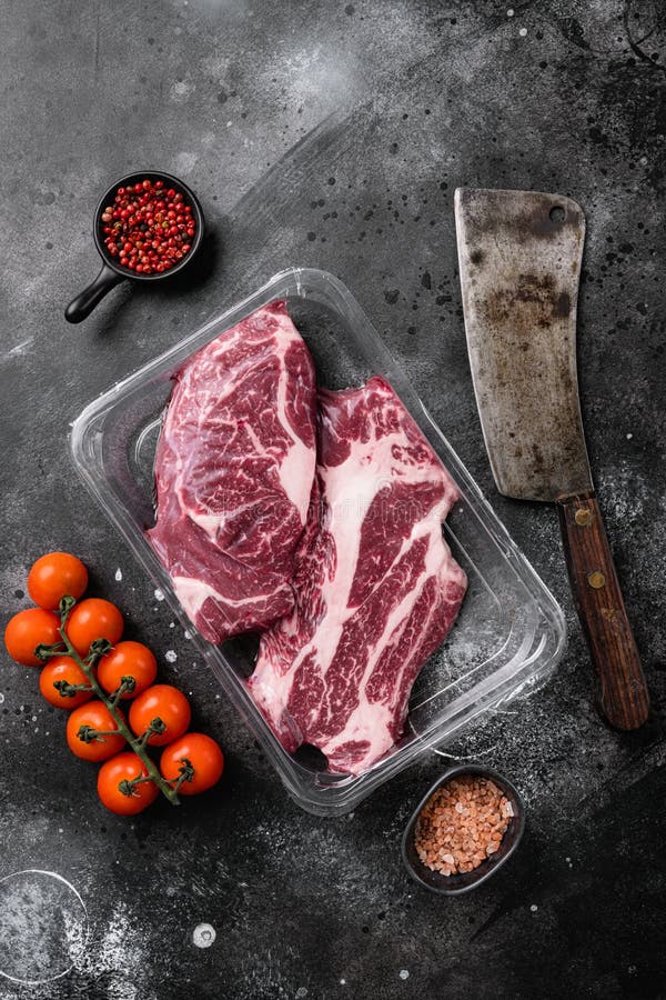 Chuck Roll Pack, on Black Dark Stone Table Background, Top View Flat ...