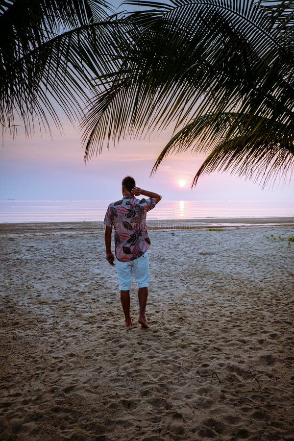 Chumphon Thailand, Guywatching Sunset on the Beach in Thailand, Men on ...