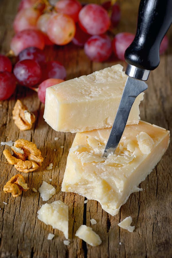 Chunk of parmesan cheese stock photo. Image of parmesano - 102615540