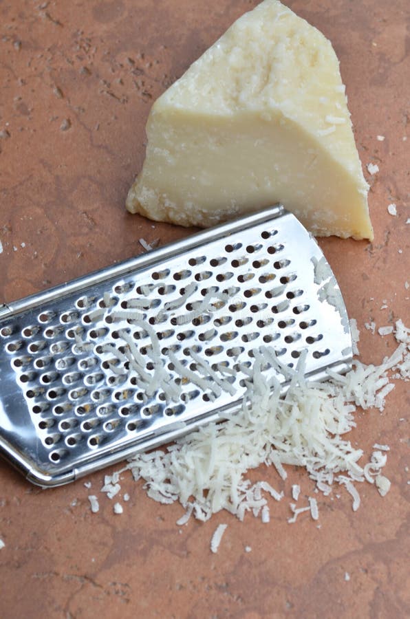 Chunk of Parmesan Cheese for Grating Stock Image - Image of closeup ...