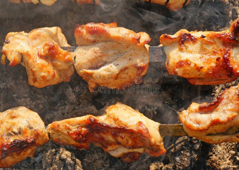 Chunks of Turkey on a Spit in the Smoke Stock Image - Image of closeup ...
