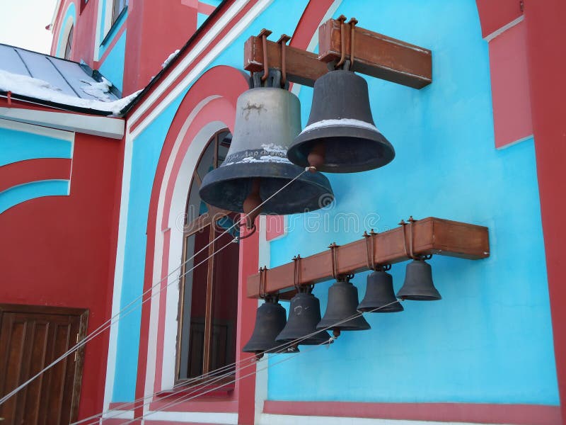 Church Bells on the Blue Wall of the Chapel Stock Image - Image of ...