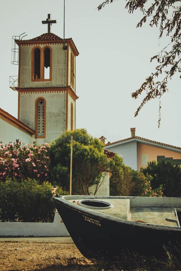 Church and Boat on Beach, Greece. Editorial Stock Photo - Image of ...