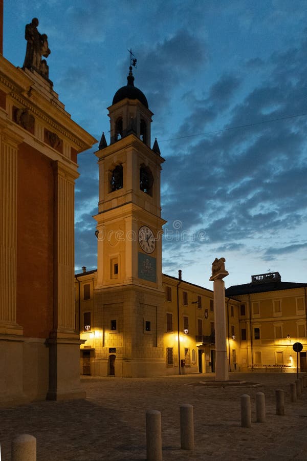 A Church with a Clock on the Side of a Building Stock Photo - Image of ...