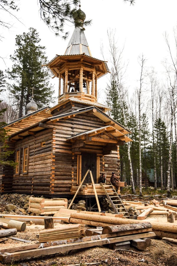 Church Construction Process. Construction of a Wooden Chapel in a Pine ...