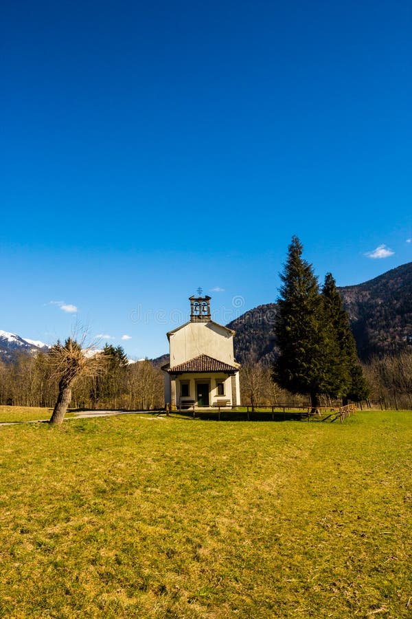 Church in the Meadows of Alps Stock Image - Image of blue, color: 38227249
