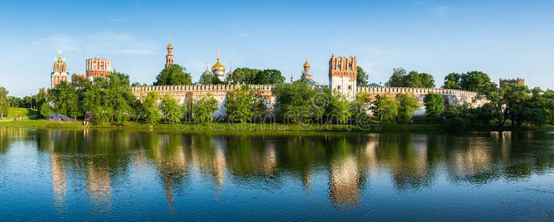 Church and Monastery in Forest with Lake in Sunshine Panorama Stock ...
