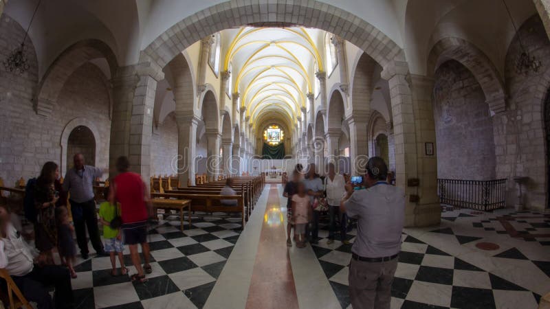 Church of the Nativity Interior with Altar and Icon Lamps Hanging on ...