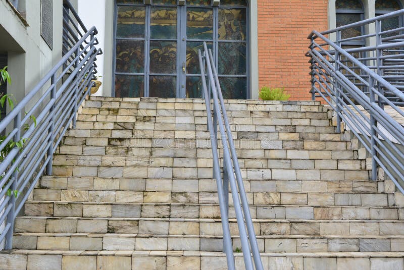 Church Staircase with Handrail and Glass Doors with Embossed Designs ...