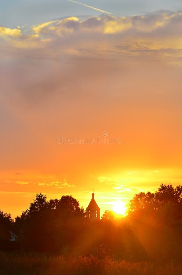 Church in the sunset stock photo. Image of afterglow - 206686750