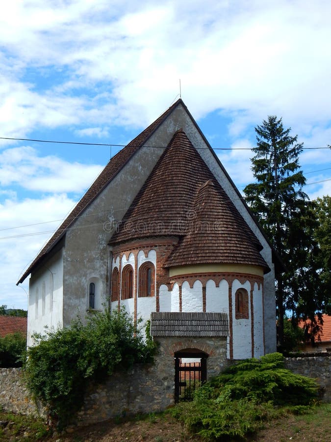 The Church of Szalonna (Hungary) Stock Photo - Image of gate, clouds ...