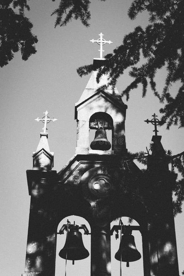 The Church with Three Bells on the Bell Tower is Black and White Stock ...