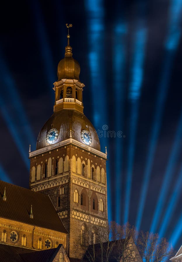 Church Tower with Clocks - Blue Floodlight in the Sky Stock Image ...